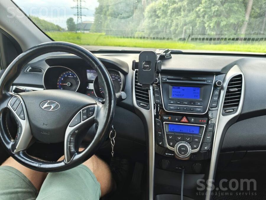 Brown Hyundai i30 2014 in Riga, with an engine capacity of 1.60 L and mileage of 102 thousand km for 5500 €, photo 9 on AUTOMOTO.COM.LV