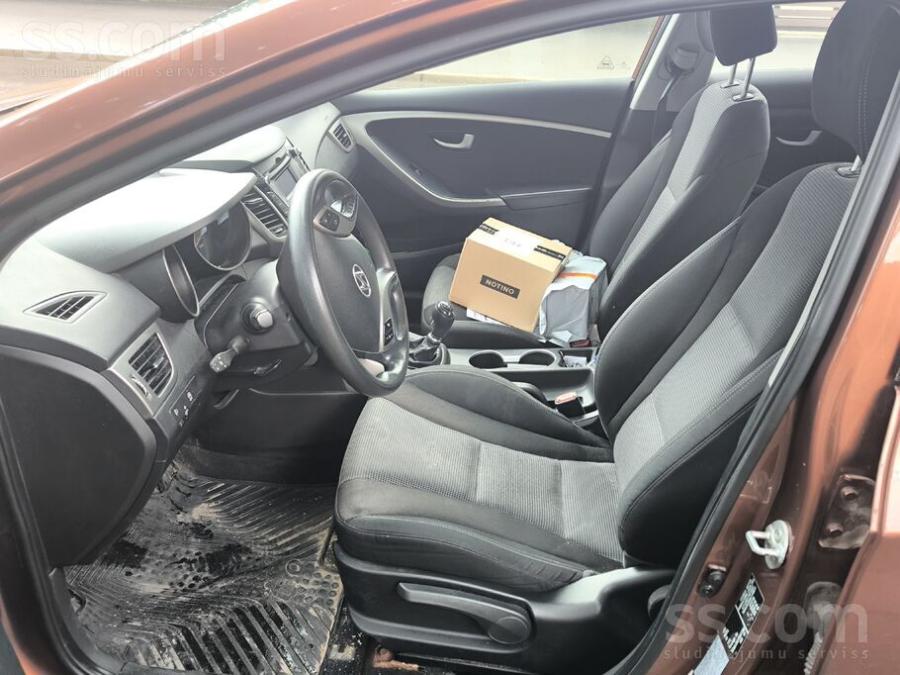 Brūns Hyundai i30 2014 Rīga, ar dzinēja tilpumu 1.40 L un nobraukumu 153 tūkst. km par 3850 €, foto 6 vietnē AUTOMOTO.COM.LV