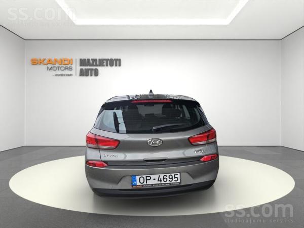 Brown Hyundai i30 2019 in Liepaja, with an engine capacity of 1.40 L and mileage of 48 thousand km for 9650 €, photo 4 on AUTOMOTO.COM.LV