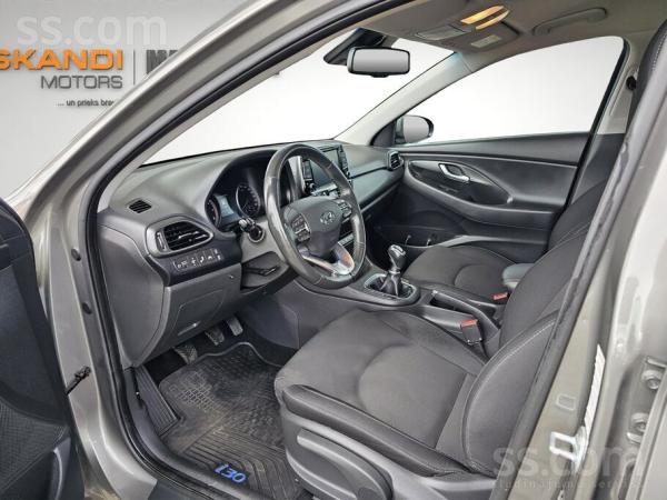 Brown Hyundai i30 2019 in Liepaja, with an engine capacity of 1.40 L and mileage of 48 thousand km for 9650 €, photo 8 on AUTOMOTO.COM.LV