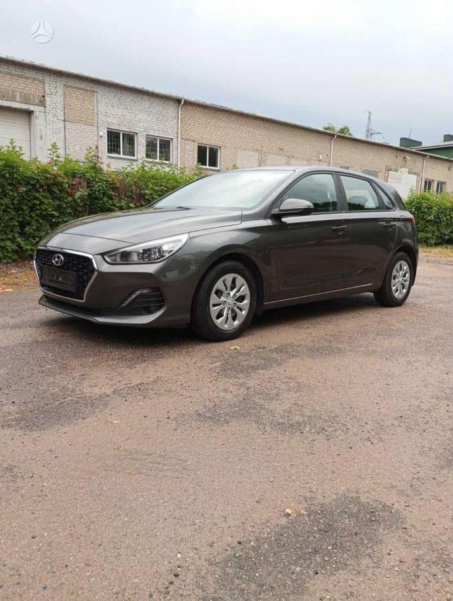 Brown Hyundai i30 2020 in Kelme, with an engine capacity of 1.40 L and mileage of 66 thousand km for 11500 €, photo 1 on AUTOMOTO.COM.LV