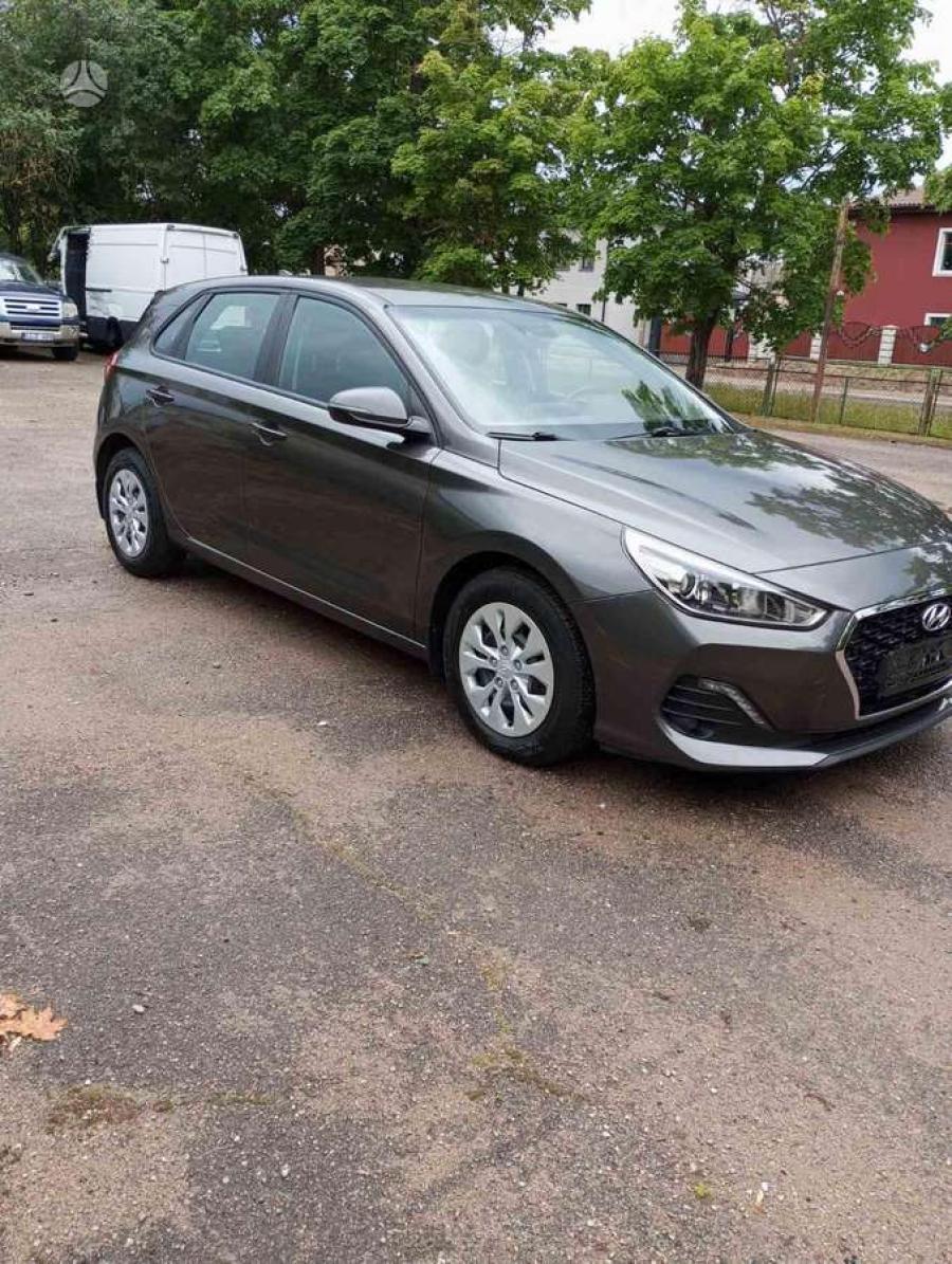 Brown Hyundai i30 2020 in Kelme, with an engine capacity of 1.40 L and mileage of 66 thousand km for 11500 €, photo 3 on AUTOMOTO.COM.LV