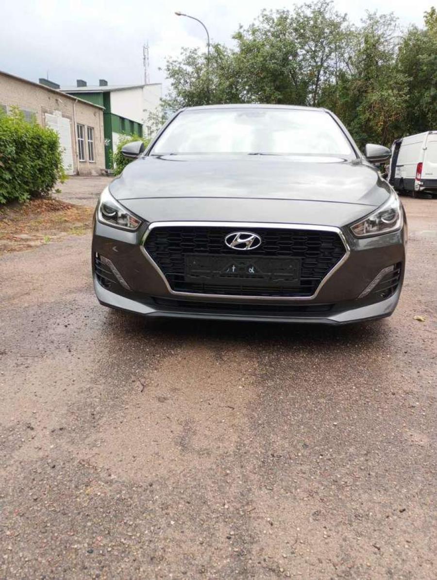 Brown Hyundai i30 2020 in Kelme, with an engine capacity of 1.40 L and mileage of 66 thousand km for 11500 €, photo 5 on AUTOMOTO.COM.LV