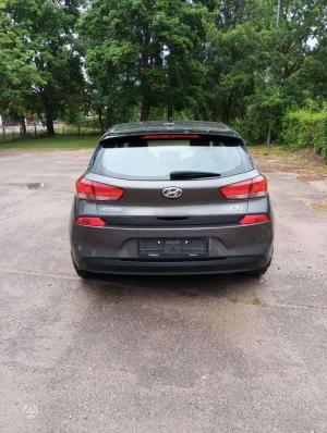 Brown Hyundai i30 2020 in Kelme, with an engine capacity of 1.40 L and mileage of 66 thousand km for 11500 €, photo 6 on AUTOMOTO.COM.LV