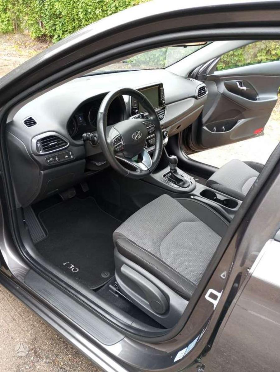Brown Hyundai i30 2020 in Kelme, with an engine capacity of 1.40 L and mileage of 66 thousand km for 11500 €, photo 7 on AUTOMOTO.COM.LV