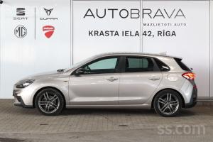 Brown Hyundai i30 2021 in Riga, with an engine capacity of 1.40 L and mileage of 92 thousand km for 12990 €, photo 5 on AUTOMOTO.COM.LV