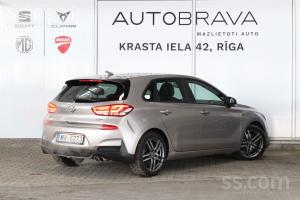 Brown Hyundai i30 2021 in Riga, with an engine capacity of 1.40 L and mileage of 92 thousand km for 12990 €, photo 7 on AUTOMOTO.COM.LV