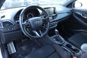 Brown Hyundai i30 2021 in Riga, with an engine capacity of 1.40 L and mileage of 92 thousand km for 12990 €, photo 10 on AUTOMOTO.COM.LV