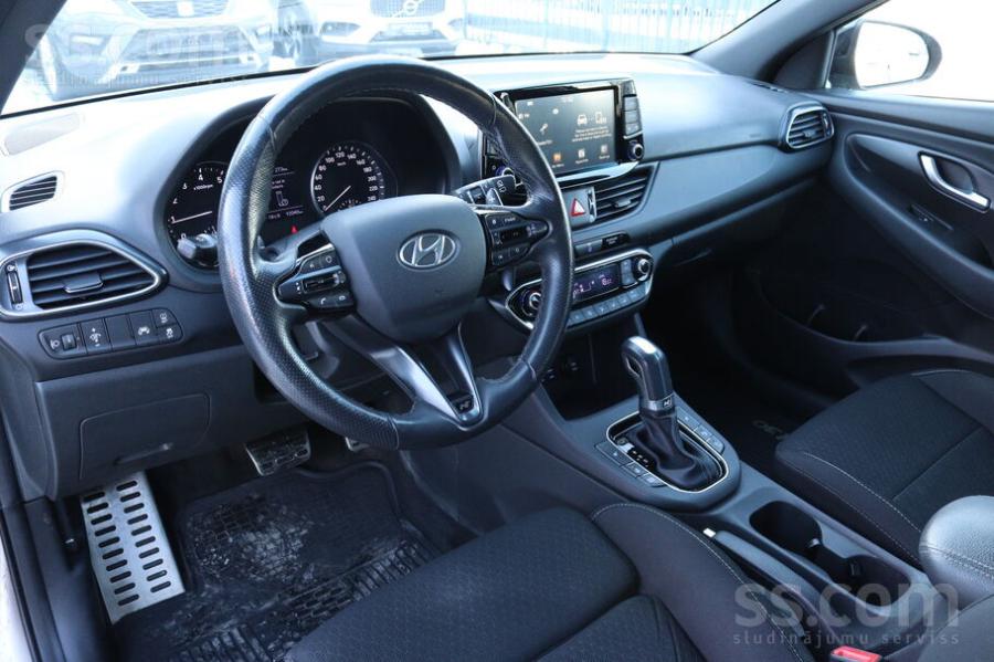 Brown Hyundai i30 2021 in Riga, with an engine capacity of 1.40 L and mileage of 92 thousand km for 12990 €, photo 10 on AUTOMOTO.COM.LV
