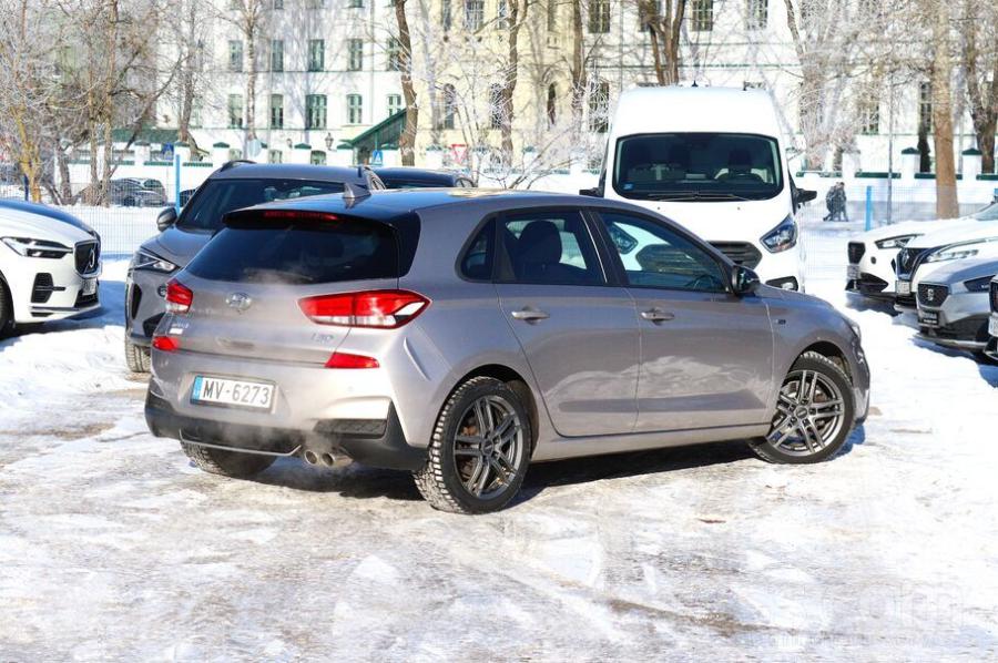 Brown Hyundai i30 2021 in Riga, with an engine capacity of 1.40 L and mileage of 92 thousand km for 12990 €, photo 31 on AUTOMOTO.COM.LV