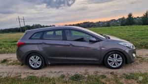 Brown Hyundai i30 2012 in Vilnius, with an engine capacity of 1.40 L and mileage of 261 thousand km for 2850 €, photo 5 on AUTOMOTO.COM.LV