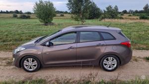 Brown Hyundai i30 2012 in Vilnius, with an engine capacity of 1.40 L and mileage of 261 thousand km for 2850 €, photo 6 on AUTOMOTO.COM.LV