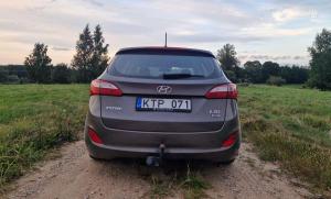 Brown Hyundai i30 2012 in Vilnius, with an engine capacity of 1.40 L and mileage of 261 thousand km for 2850 €, photo 8 on AUTOMOTO.COM.LV