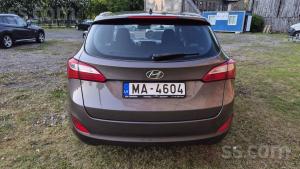Brown Hyundai i30 2014 in Liepaja, with an engine capacity of 1.40 L and mileage of 203 thousand km for 2850 €, photo 5 on AUTOMOTO.COM.LV