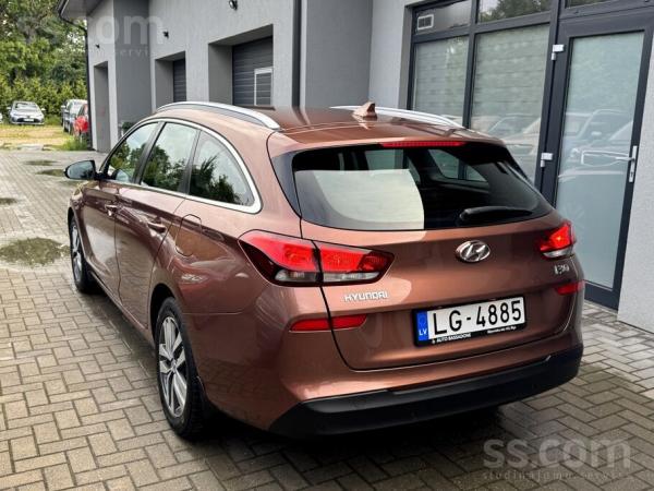 Brown Hyundai i30 2018 in Riga, with an engine capacity of 1.40 L and mileage of 215 thousand km for 8000 €, photo 4 on AUTOMOTO.COM.LV
