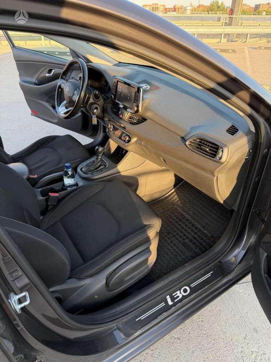 Brown Hyundai i30 2018 in Vilnius, with an engine capacity of 1.58 L and mileage of 174 thousand km for 7500 €, photo 20 on AUTOMOTO.COM.LV