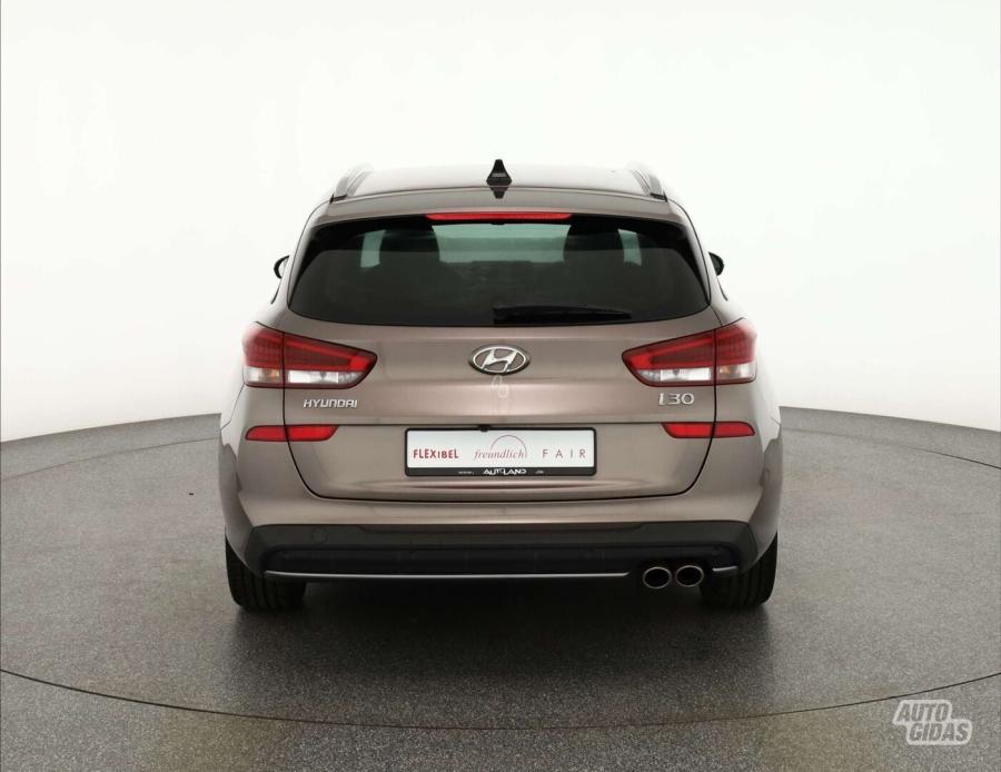 Brown Hyundai i30 2021 in Kaunas, with an engine capacity of 1.00 L and mileage of 81 thousand km for 22390 €, photo 4 on AUTOMOTO.COM.LV