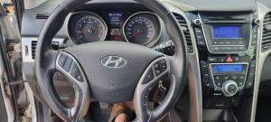 Grey Hyundai i30 2012 in Siauliai, with an engine capacity of 1.40 L and mileage of 198 thousand km for 4222 €, photo 8 on AUTOMOTO.COM.LV
