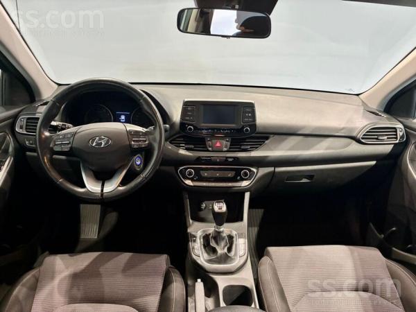 Grey Hyundai i30 2018 in Riga, with an engine capacity of 1.40 L and mileage of 102 thousand km for 6490 €, photo 7 on AUTOMOTO.COM.LV