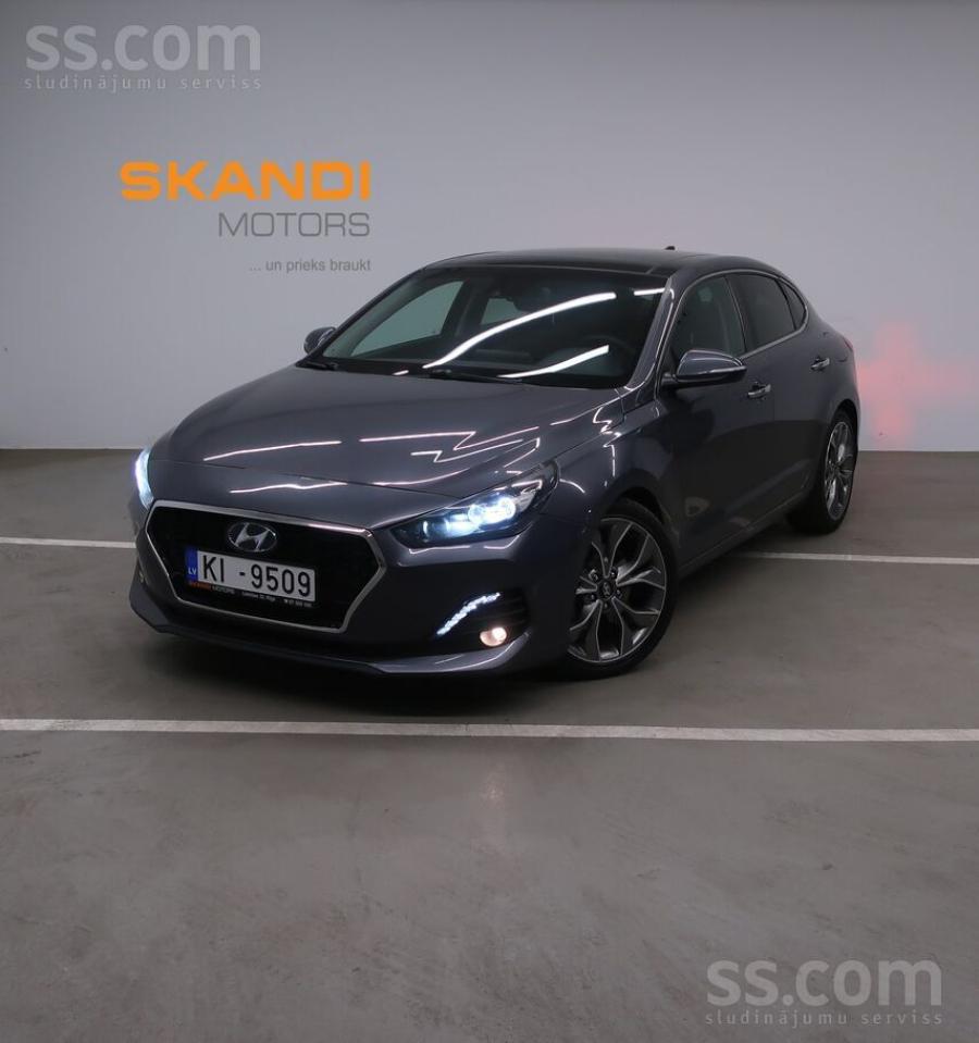 Grey Hyundai i30 2019 in Riga, with an engine capacity of 1.40 L and mileage of 86 thousand km for 13990 €, photo 1 on AUTOMOTO.COM.LV