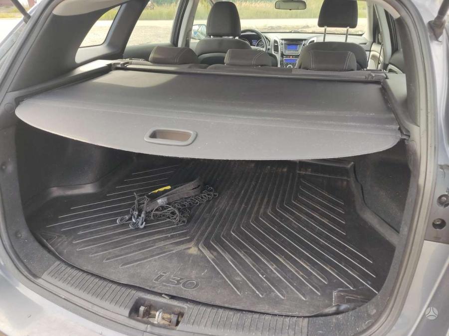 Grey Hyundai i30 2013 in Prienai, with an engine capacity of 1.59 L and mileage of 161 thousand km for 5150 €, photo 13 on AUTOMOTO.COM.LV