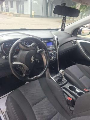 Grey Hyundai i30 2014 in Kaunas, with an engine capacity of 1.40 L and mileage of 370 thousand km for 3150 €, photo 6 on AUTOMOTO.COM.LV