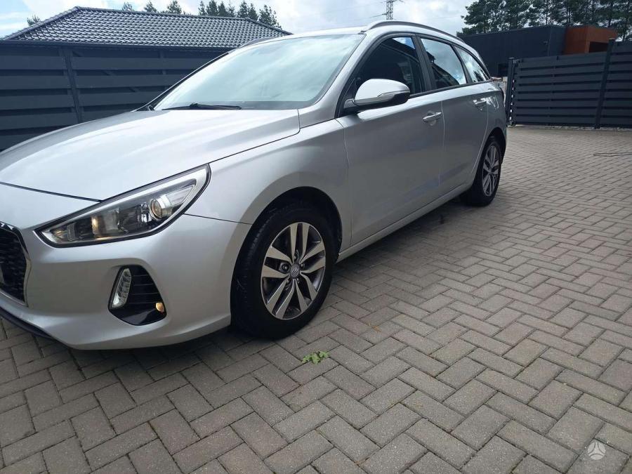 Grey Hyundai i30 2018 in Kaunas, with an engine capacity of 1.58 L and mileage of 174 thousand km for 5950 €, photo 1 on AUTOMOTO.COM.LV