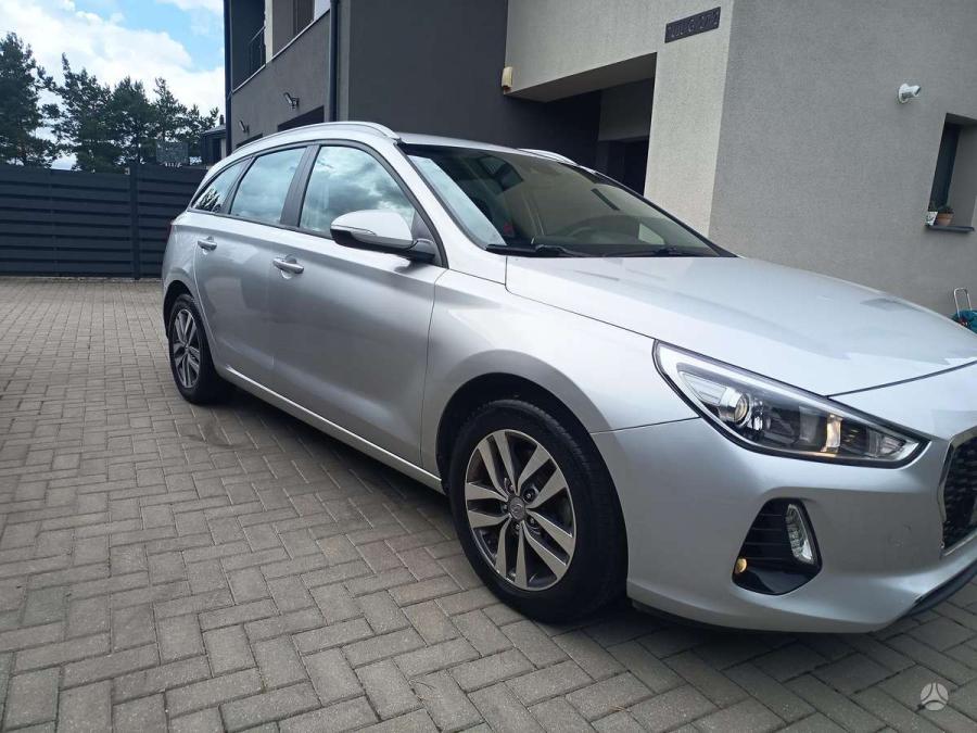 Grey Hyundai i30 2018 in Kaunas, with an engine capacity of 1.58 L and mileage of 174 thousand km for 5950 €, photo 6 on AUTOMOTO.COM.LV