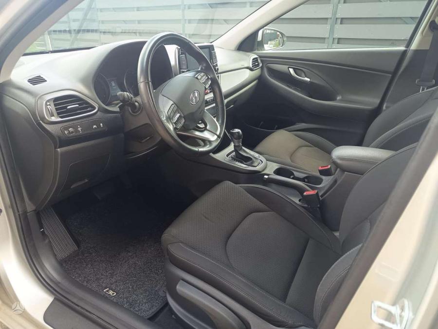 Grey Hyundai i30 2018 in Kaunas, with an engine capacity of 1.58 L and mileage of 174 thousand km for 5950 €, photo 15 on AUTOMOTO.COM.LV