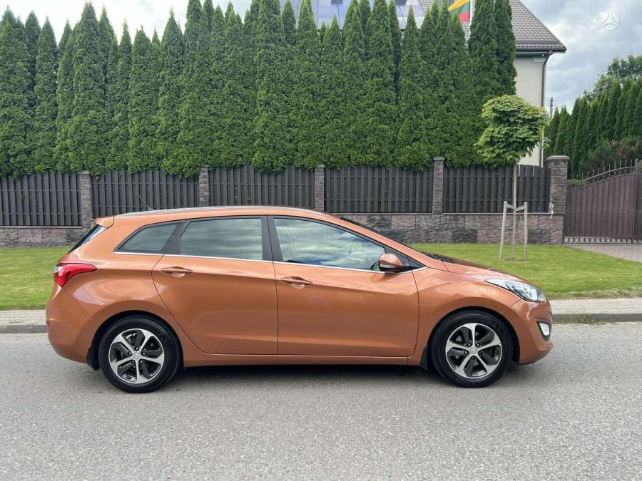 Orange Hyundai i30 2017 in Vilnius, with an engine capacity of 1.59 L and mileage of 240 thousand km for 5500 €, photo 6 on AUTOMOTO.COM.LV