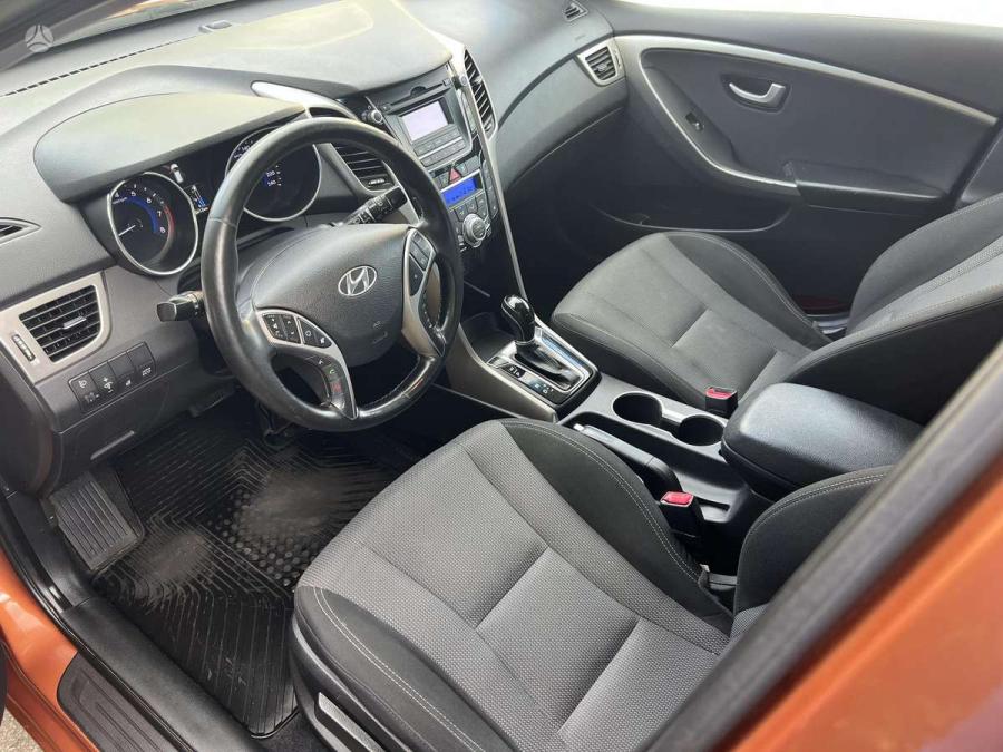 Orange Hyundai i30 2017 in Vilnius, with an engine capacity of 1.59 L and mileage of 240 thousand km for 5500 €, photo 11 on AUTOMOTO.COM.LV