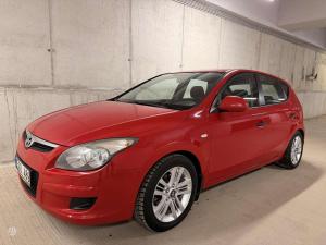 Red Hyundai i30 2009 in Vilnius, with an engine capacity of 1.40 L and mileage of 194 thousand km for 2200 €, photo 9 on AUTOMOTO.COM.LV
