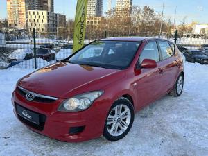Red Hyundai i30 2009 in Vilnius, with an engine capacity of 1.40 L and mileage of 194 thousand km for 2400 €, photo 6 on AUTOMOTO.COM.LV