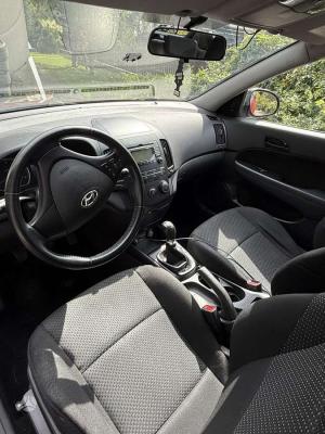 Red Hyundai i30 2012 in Vilnius, with an engine capacity of 1.58 L and mileage of 256 thousand km for 800 €, photo 12 on AUTOMOTO.COM.LV