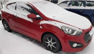 Sarkans Hyundai i30 2013 Marijampole, ar dzinēja tilpumu 1.40 L un nobraukumu 157 tūkst. km par 2950 €, foto  vietnē AUTOMOTO.COM.LV