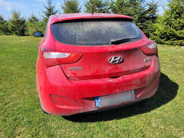 Red Hyundai i30 2013 in Kaunas, with an engine capacity of 1.40 L and mileage of 260 thousand km for 1999 €, photo 3 on AUTOMOTO.COM.LV