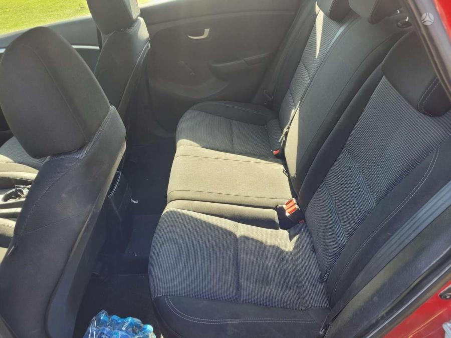 Red Hyundai i30 2013 in Kaunas, with an engine capacity of 1.40 L and mileage of 260 thousand km for 1999 €, photo 7 on AUTOMOTO.COM.LV