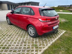 Red Hyundai i30 2017 in Tallinn, with an engine capacity of 1.40 L and mileage of 112 thousand km for 10500 €, photo 5 on AUTOMOTO.COM.LV