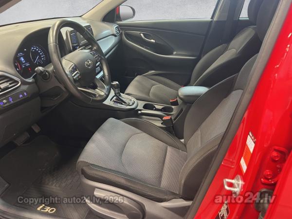 Red Hyundai i30 2018 in Tallinn, with an engine capacity of 1.40 L and mileage of 92 thousand km for 10500 €, photo 8 on AUTOMOTO.COM.LV