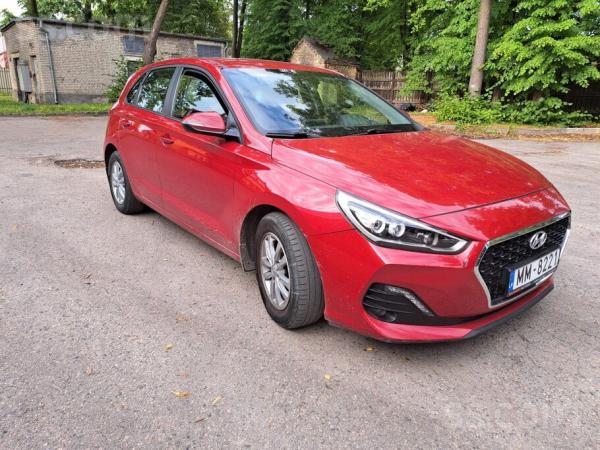 Red Hyundai i30 2020 in Riga, with an engine capacity of 1.40 L and mileage of 87 thousand km for 10300 €, photo 1 on AUTOMOTO.COM.LV