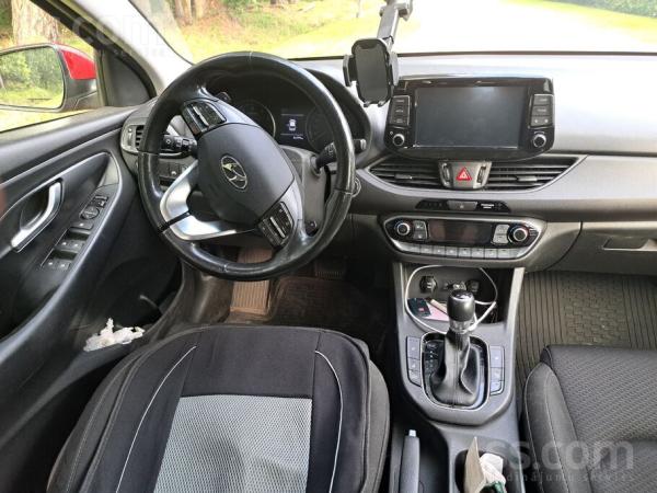 Red Hyundai i30 2020 in Riga, with an engine capacity of 1.40 L and mileage of 87 thousand km for 10300 €, photo 8 on AUTOMOTO.COM.LV