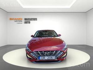 Red Hyundai i30 2021 in Liepaja, with an engine capacity of 1.50 L and mileage of 76 thousand km for 13490 €, photo 3 on AUTOMOTO.COM.LV