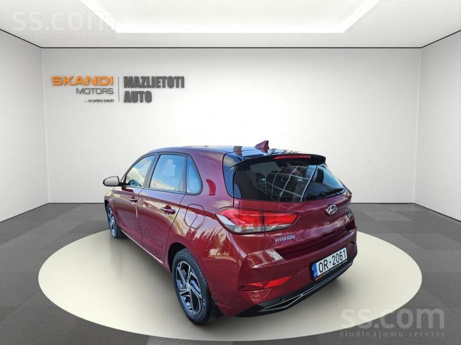 Red Hyundai i30 2021 in Liepaja, with an engine capacity of 1.50 L and mileage of 76 thousand km for 13490 €, photo 5 on AUTOMOTO.COM.LV