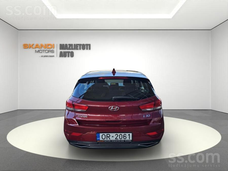 Red Hyundai i30 2021 in Liepaja, with an engine capacity of 1.50 L and mileage of 76 thousand km for 13490 €, photo 6 on AUTOMOTO.COM.LV