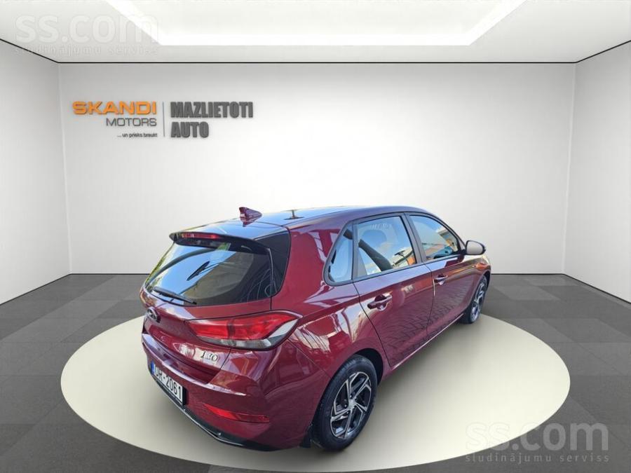 Red Hyundai i30 2021 in Liepaja, with an engine capacity of 1.50 L and mileage of 76 thousand km for 13490 €, photo 7 on AUTOMOTO.COM.LV