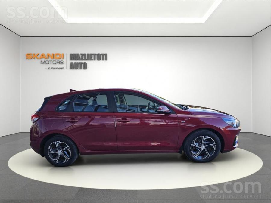 Red Hyundai i30 2021 in Liepaja, with an engine capacity of 1.50 L and mileage of 76 thousand km for 13490 €, photo 8 on AUTOMOTO.COM.LV