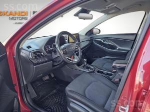 Red Hyundai i30 2021 in Liepaja, with an engine capacity of 1.50 L and mileage of 76 thousand km for 13490 €, photo 10 on AUTOMOTO.COM.LV