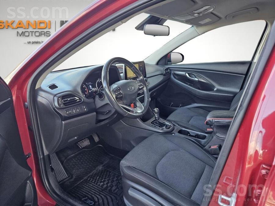 Red Hyundai i30 2021 in Liepaja, with an engine capacity of 1.50 L and mileage of 76 thousand km for 13490 €, photo 10 on AUTOMOTO.COM.LV