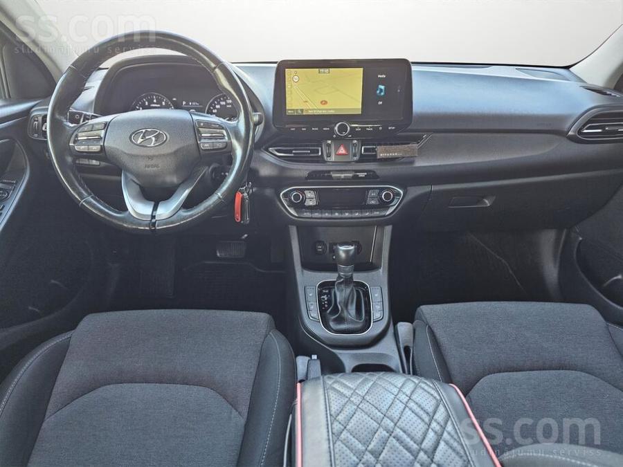 Red Hyundai i30 2021 in Liepaja, with an engine capacity of 1.50 L and mileage of 76 thousand km for 13490 €, photo 12 on AUTOMOTO.COM.LV