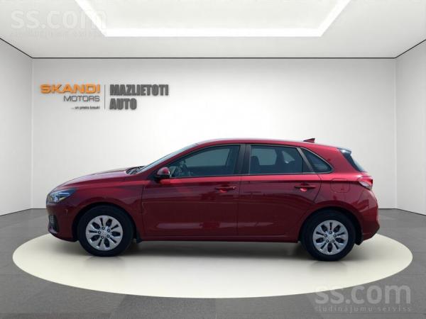 Red Hyundai i30 2022 in Riga, with an engine capacity of 1.50 L and mileage of 80 thousand km for 11990 €, photo 3 on AUTOMOTO.COM.LV